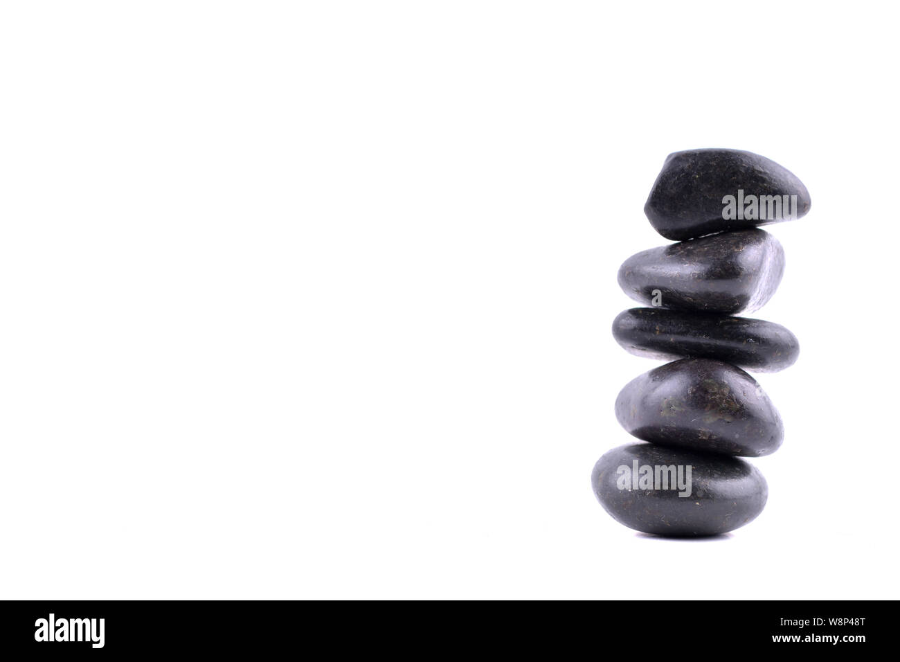 Zen stones balance concept isolated on white Stock Photo - Alamy
