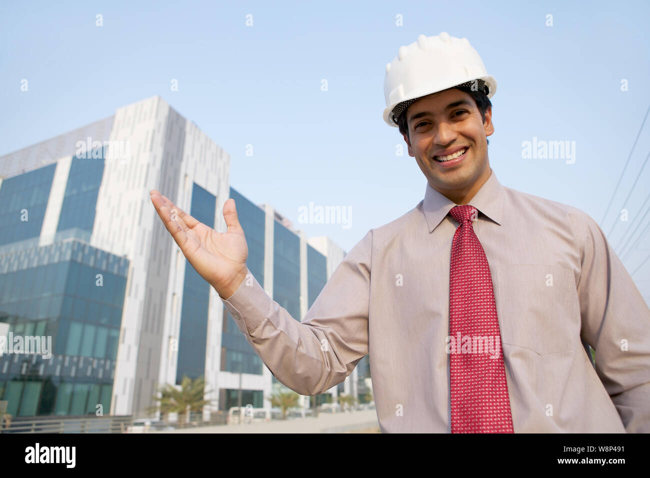 Architect showing his office building Stock Photo - Alamy