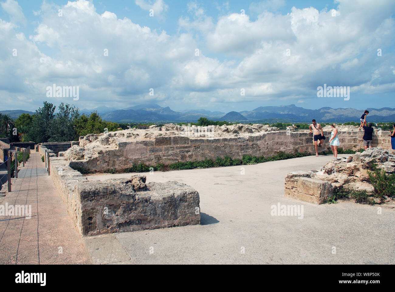 The walkway on top of the medieval town wall at Alcudia on the Spanish ...