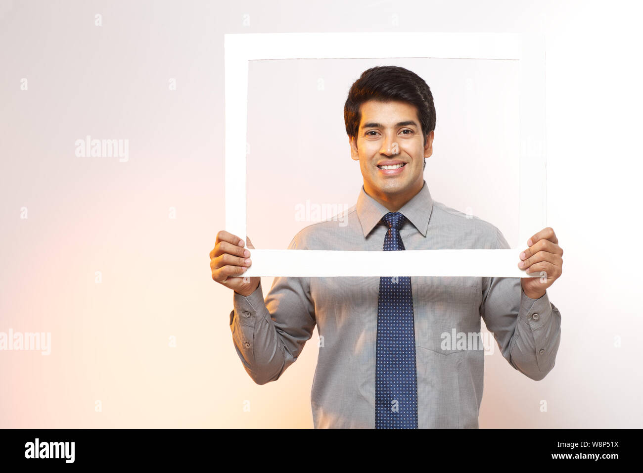 Businessman framing herself Stock Photo - Alamy