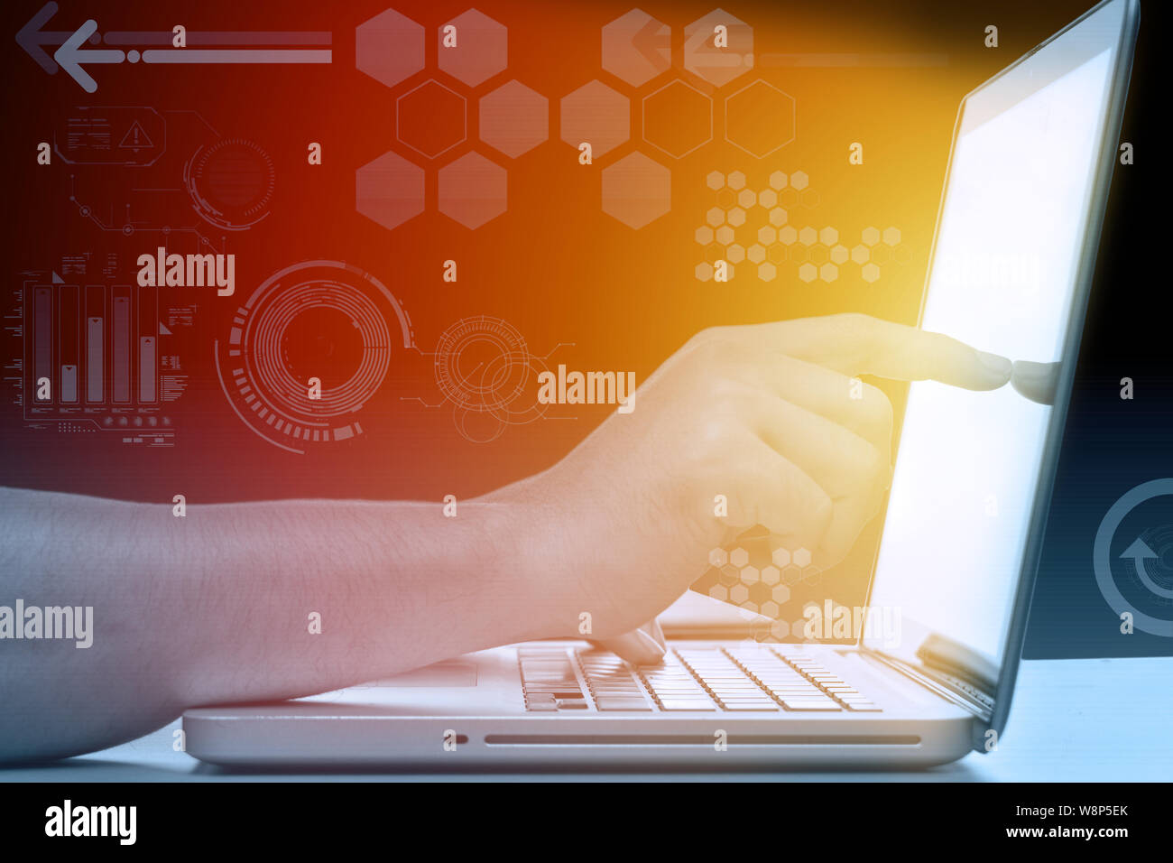 Finger touching screen of laptop Stock Photo - Alamy