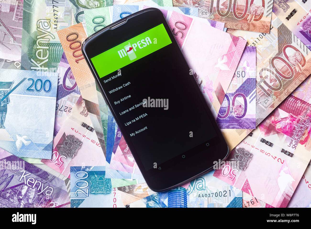 Safaricom M-Pesa fintech microfinance money transaction service on ...