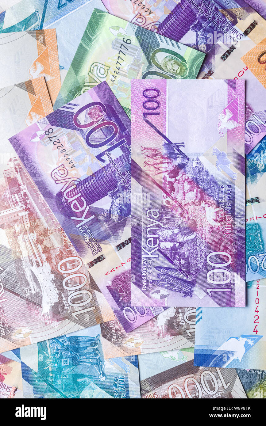 New 2019 Kenyan 100 Shilling bank notes on top of other bank notes in ...