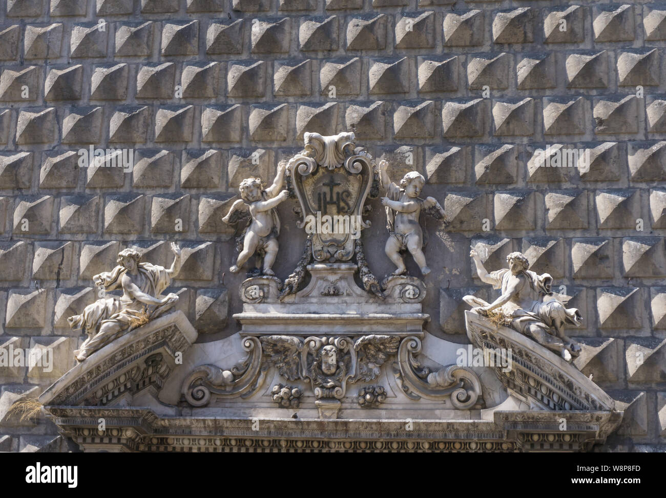 Sculptures of angels on the wall Stock Photo - Alamy