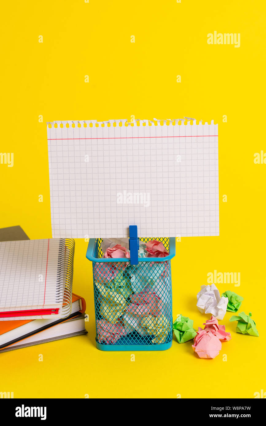 Trash bin crumpled paper clothespin empty reminder office supplies ...