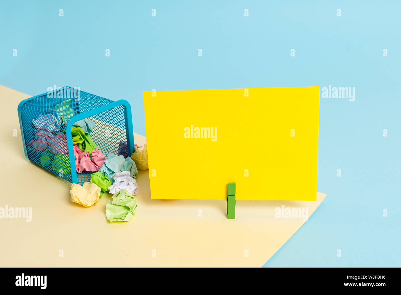 Trash bin crumpled paper clothespin empty reminder office supplies ...