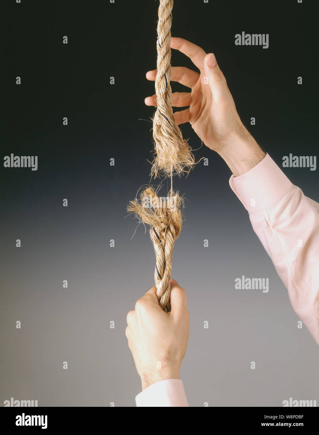 Hand holding rope hi-res stock photography and images - Alamy