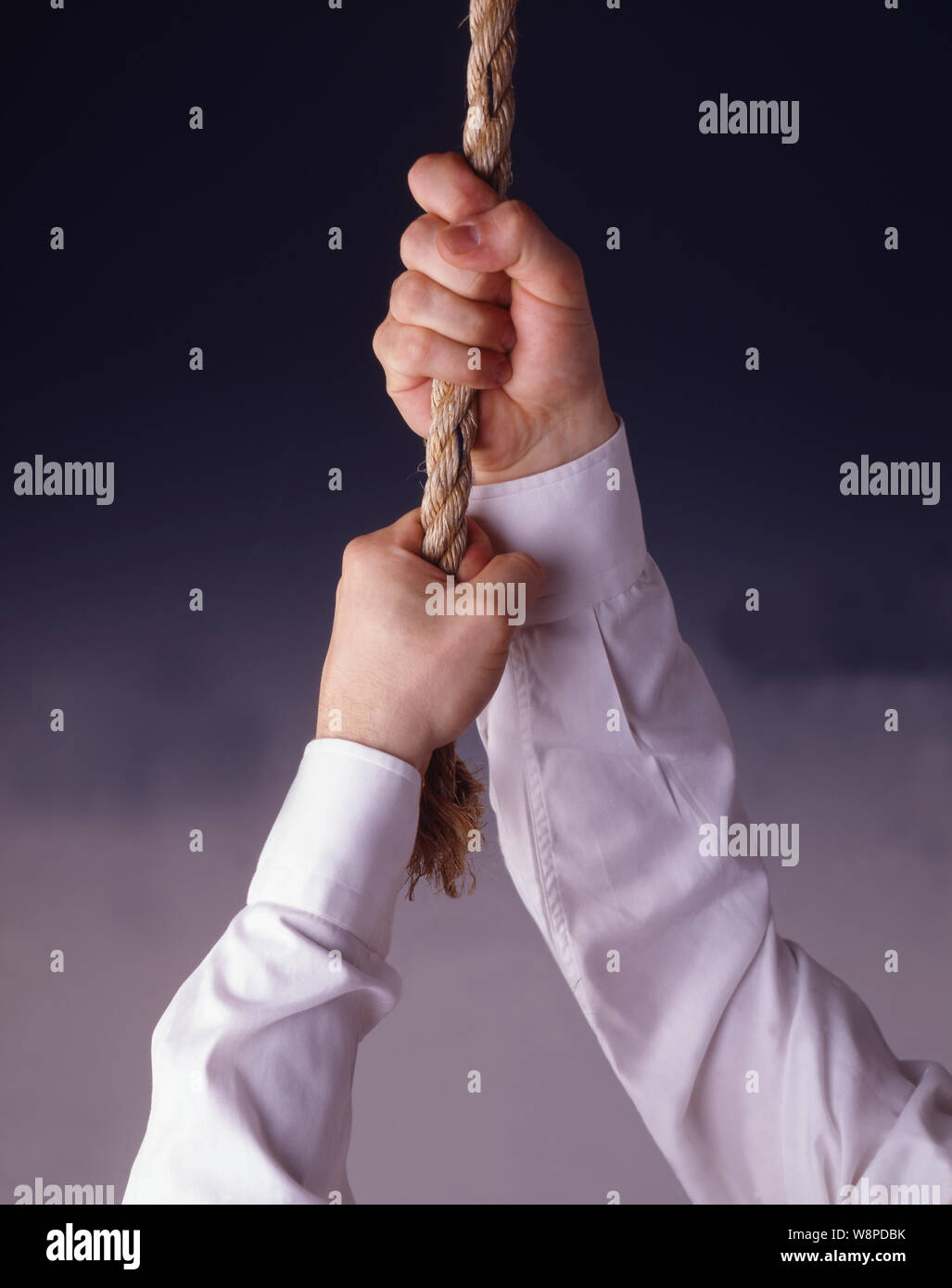 Hand pulling a rope hi-res stock photography and images - Alamy