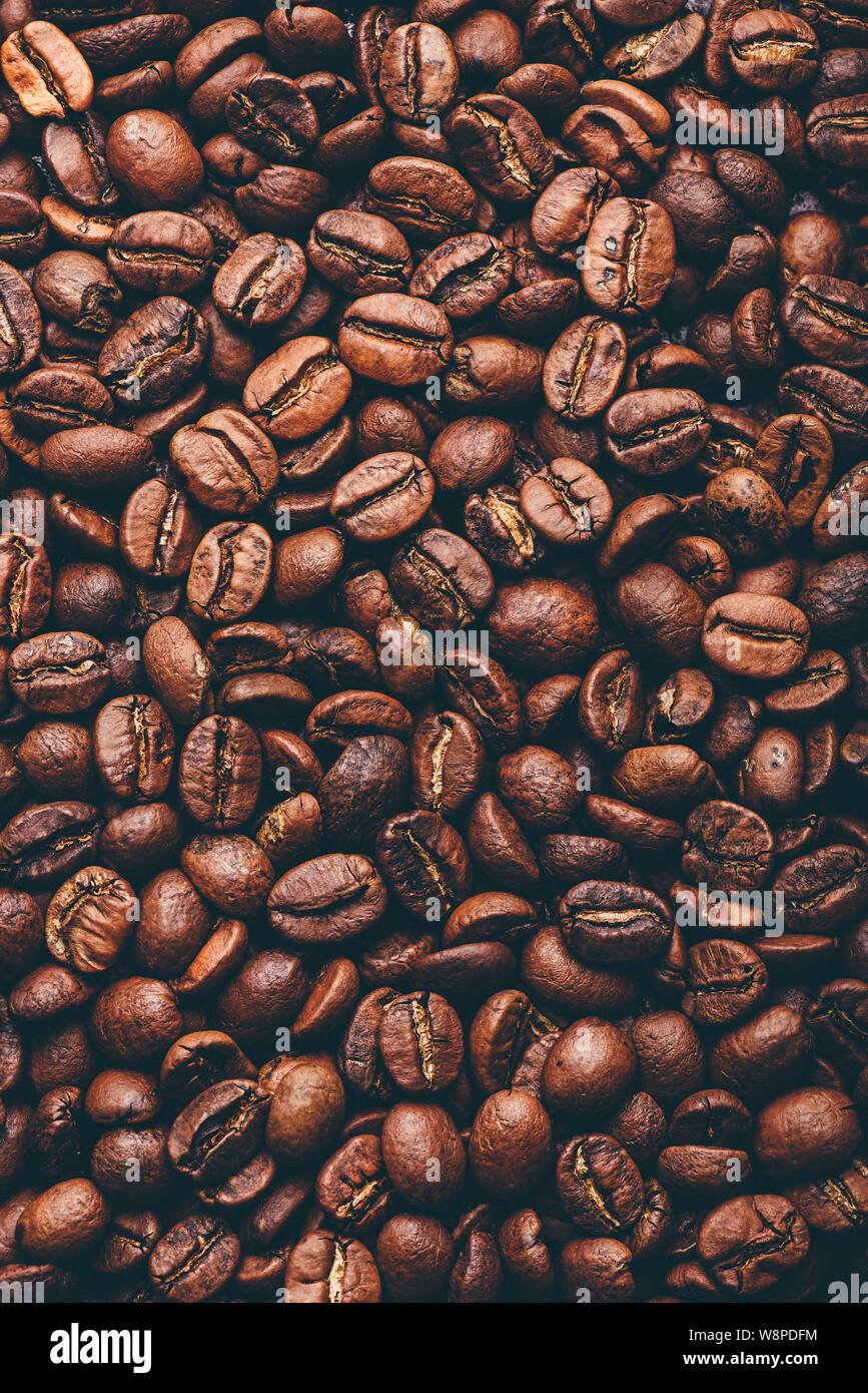 Background of fresh roasted coffee beans. View from above Stock Photo ...