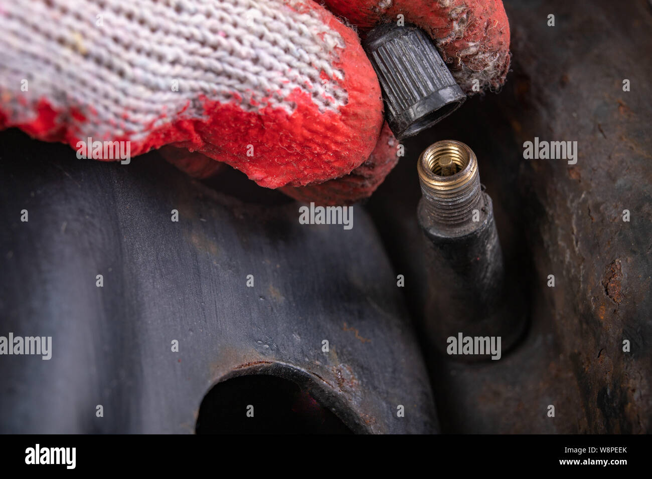 The valve in the car wheel. Replacement and service of tires in a ...