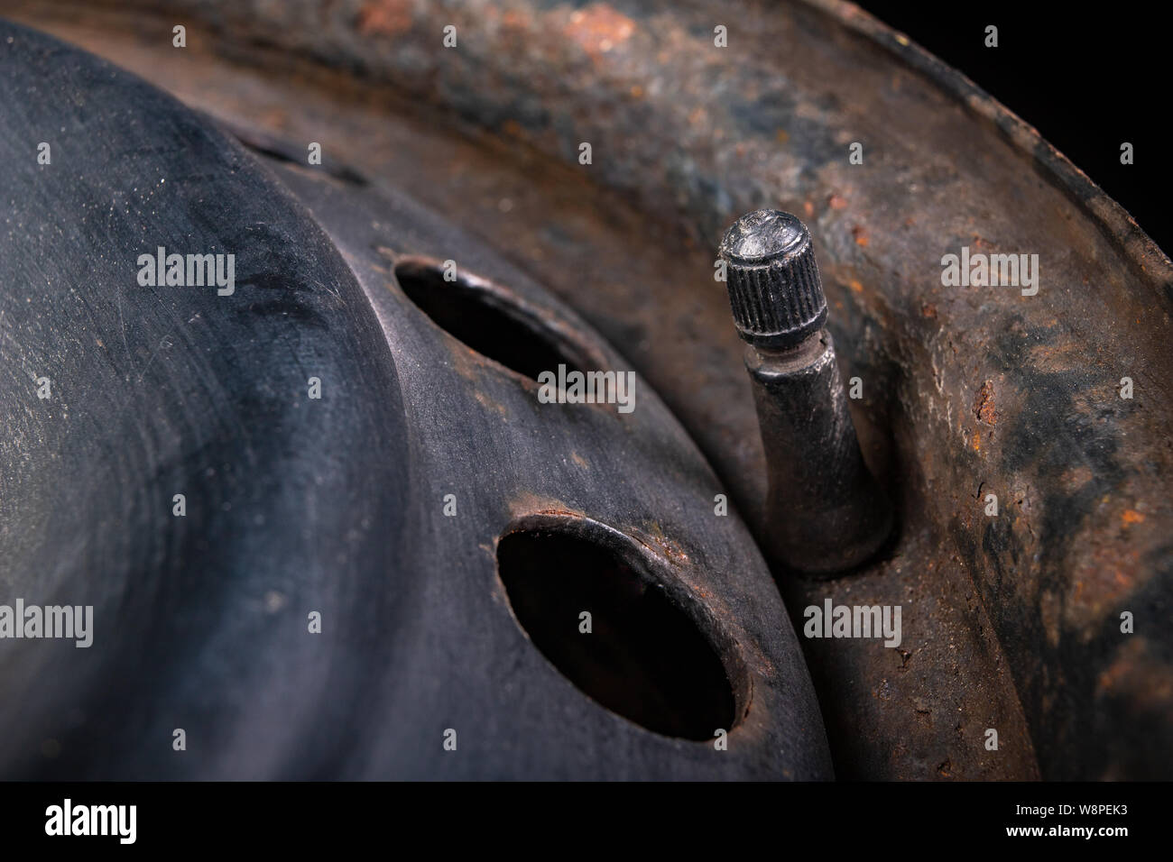 The valve in the car wheel. Replacement and service of tires in a ...