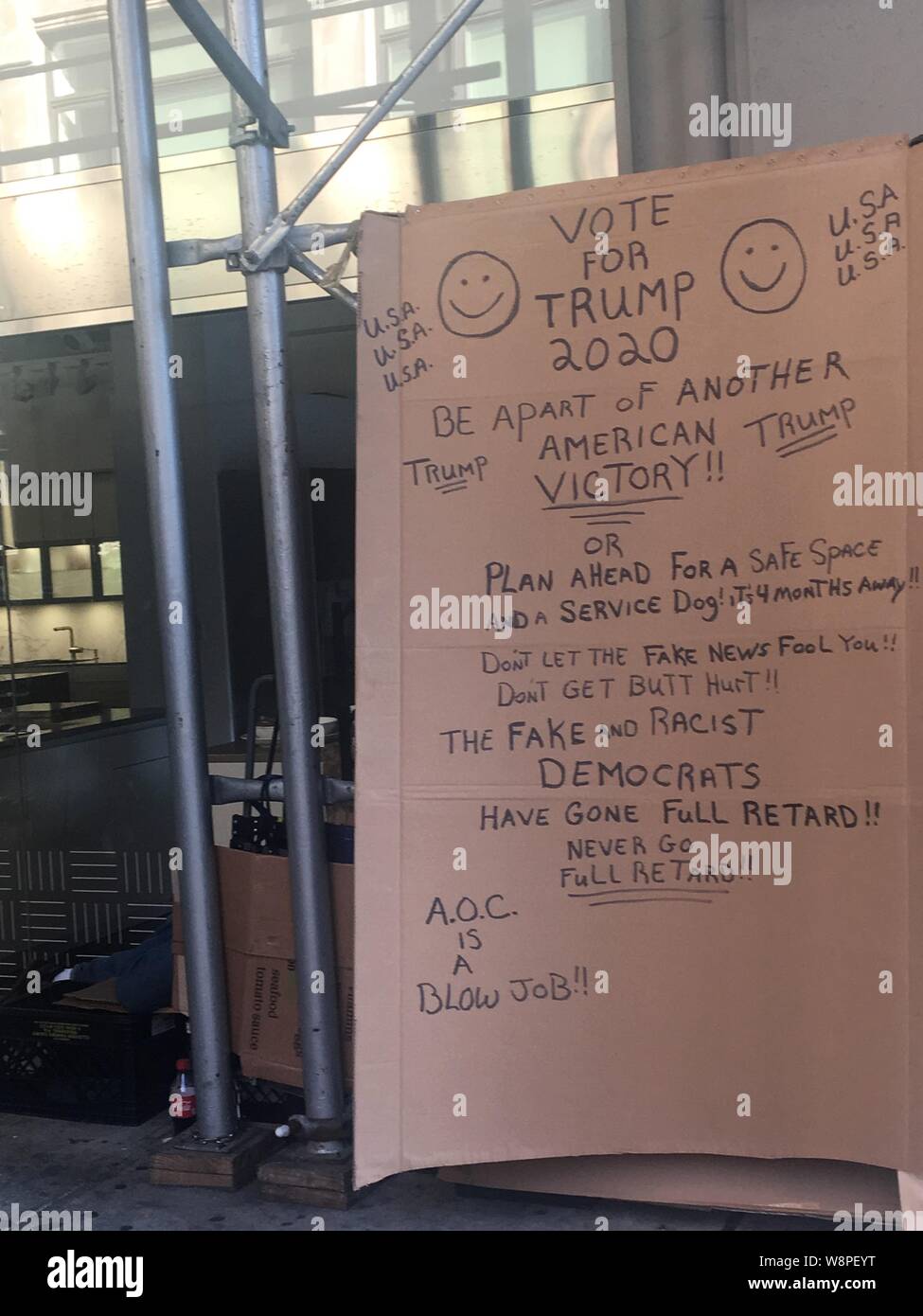 New York, NY, USA. 10th Aug, 2019. Cardboard signs from a homeless ...