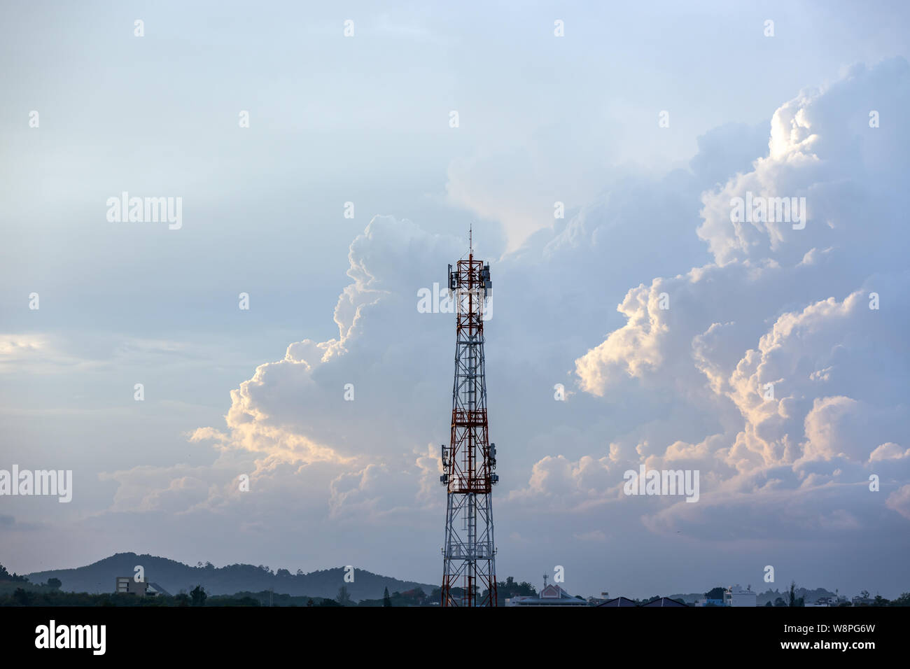 Silhouette signal antenna tower at beautiful sunrise sky background ...