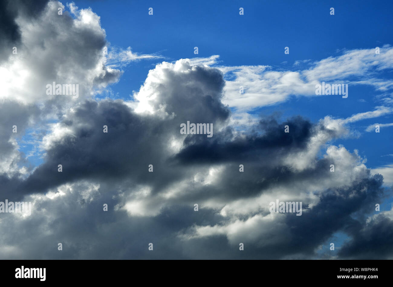 Pale blue cloudy sky hi-res stock photography and images - Alamy