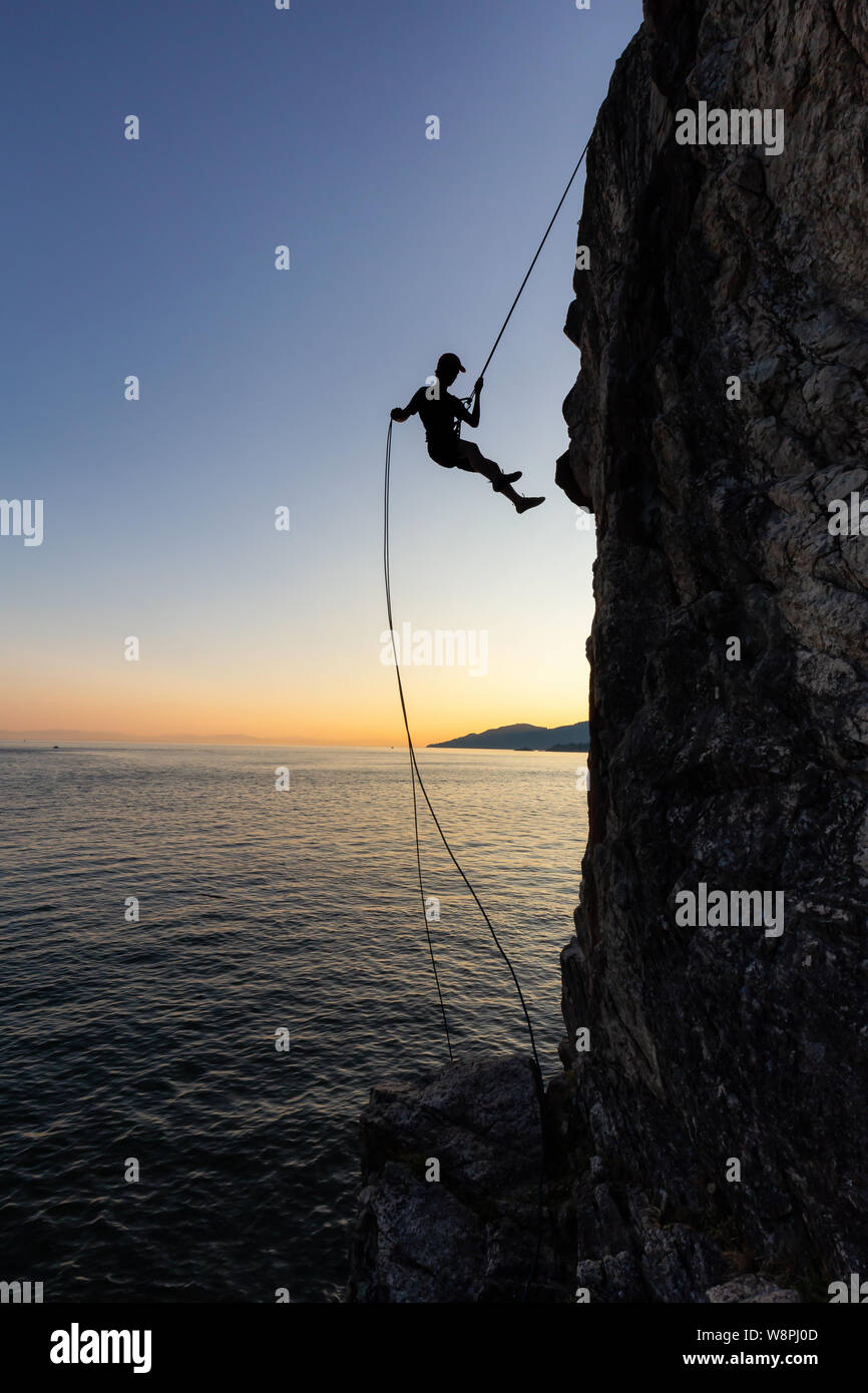 Rappelling cliff silhouette hi-res stock photography and images - Alamy