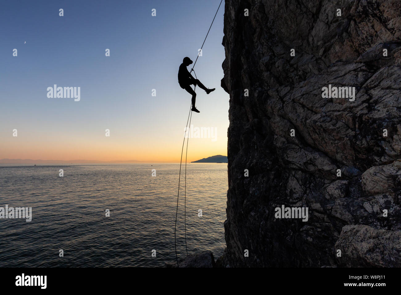 Man water rappelling active hi-res stock photography and images - Alamy