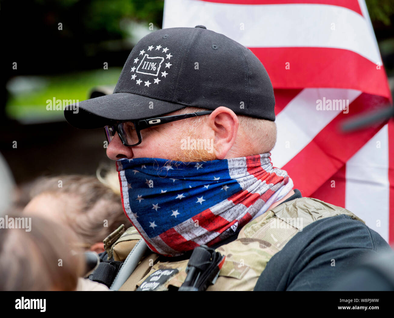 Eugene, OREGON, USA. 10th Aug, 2019. A masked pro-gun demonstrator ...