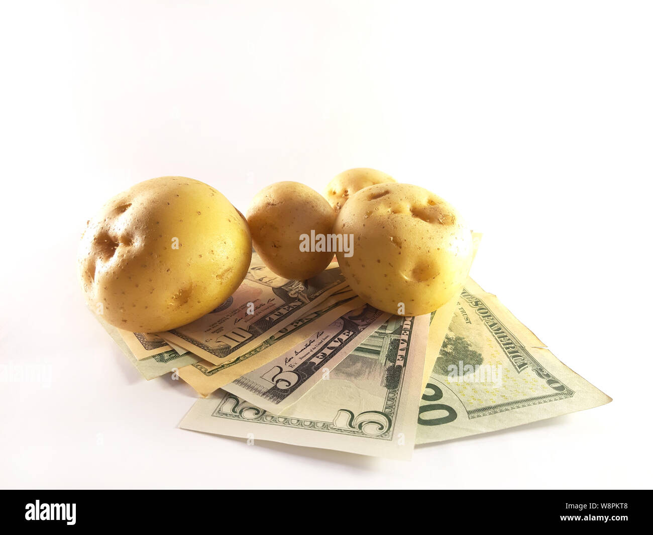 Potatoes and dollars. Food and money. Harvest, sale, income photo Stock ...