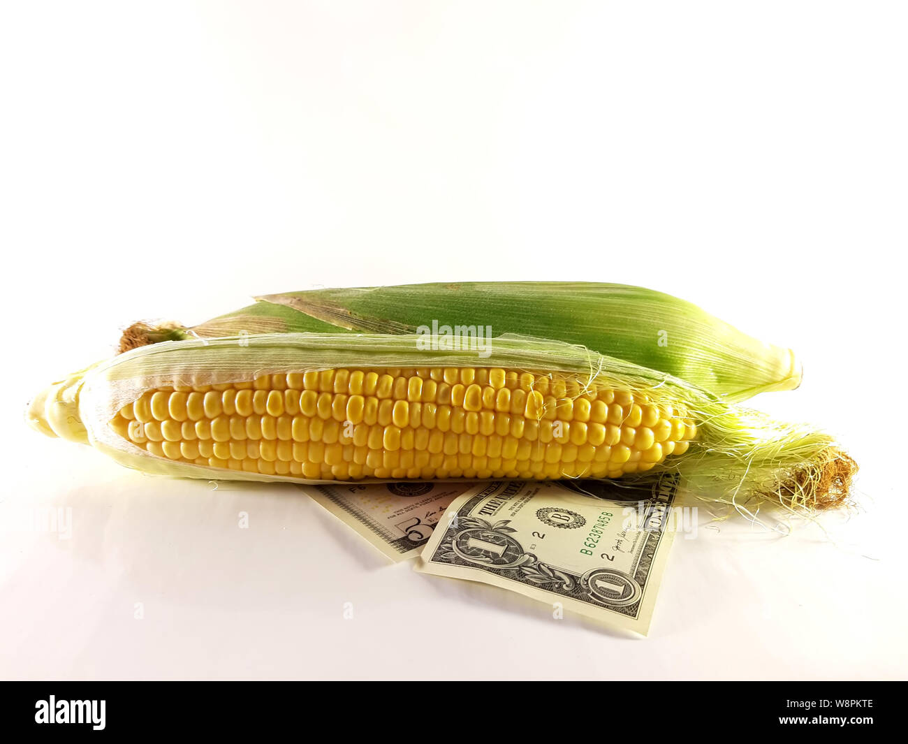 Corn and dollars. Food and money. Harvest, sale, income photo Stock ...