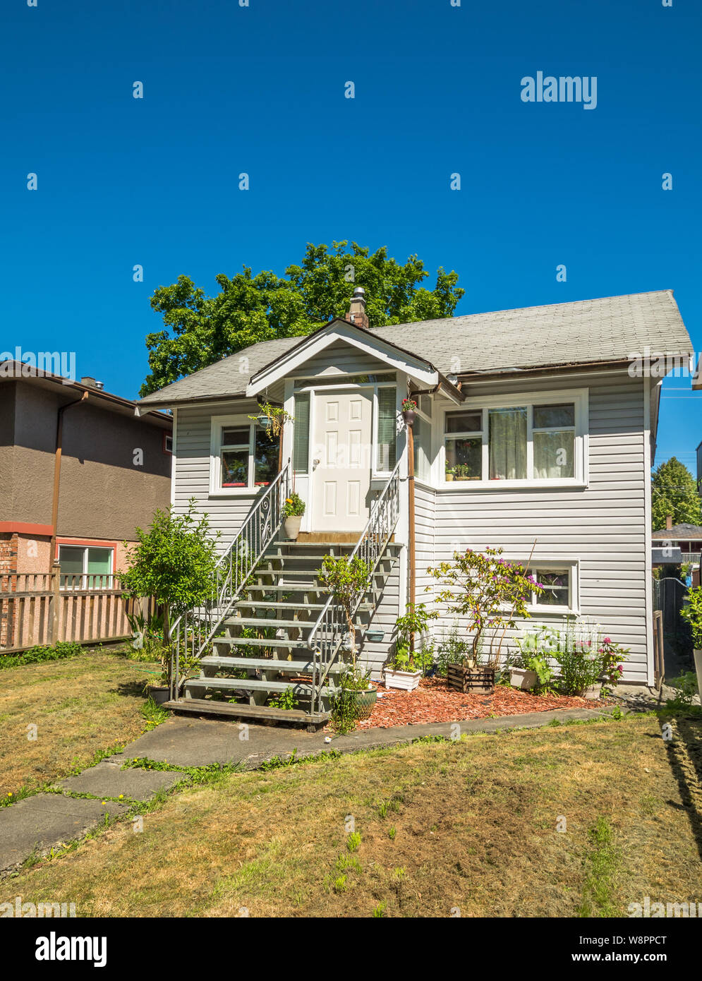 Old residential house with abandoned back yard Stock Photo - Alamy