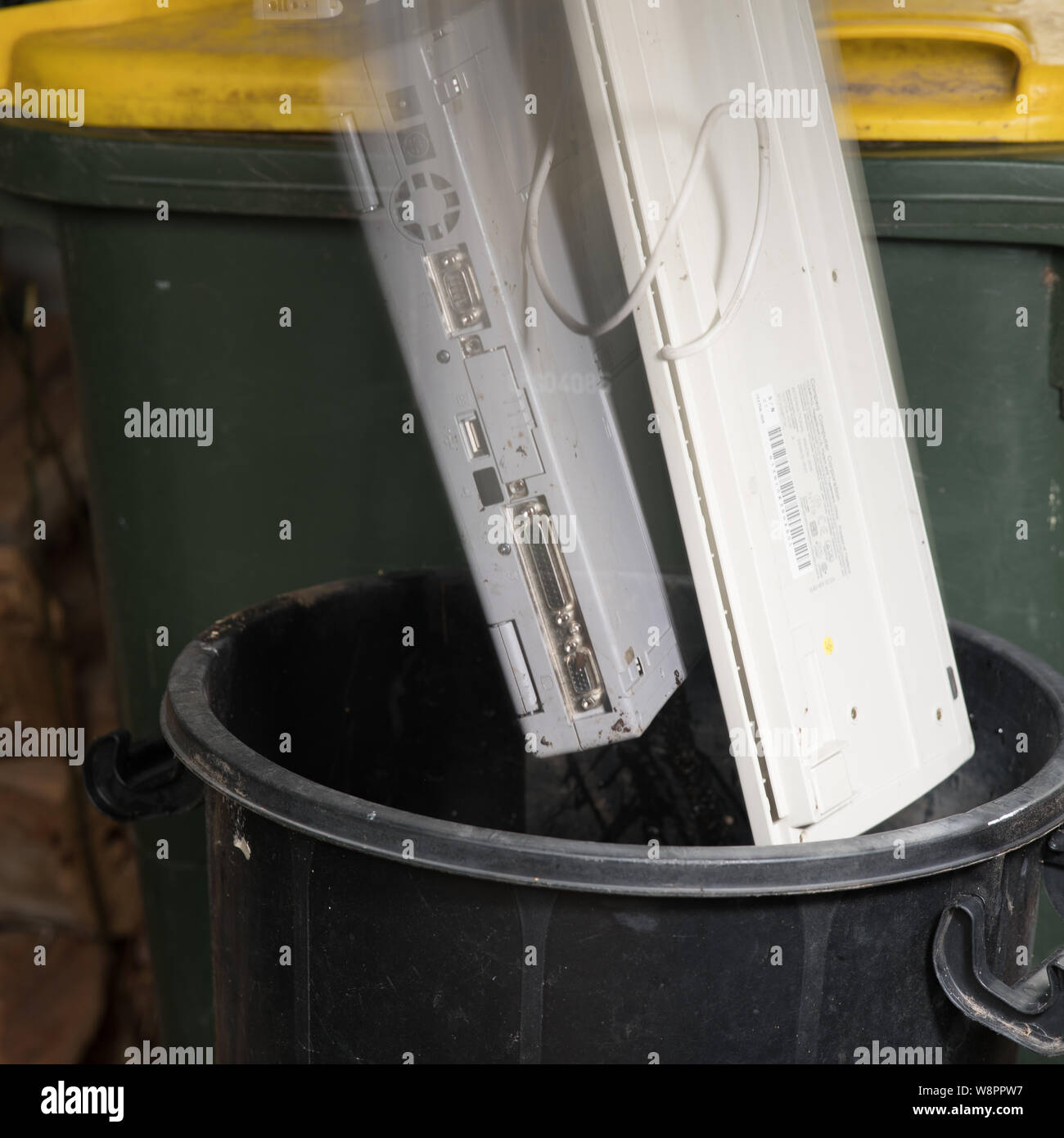 Filling the household Recycling Bin with plastic containers and empty ...