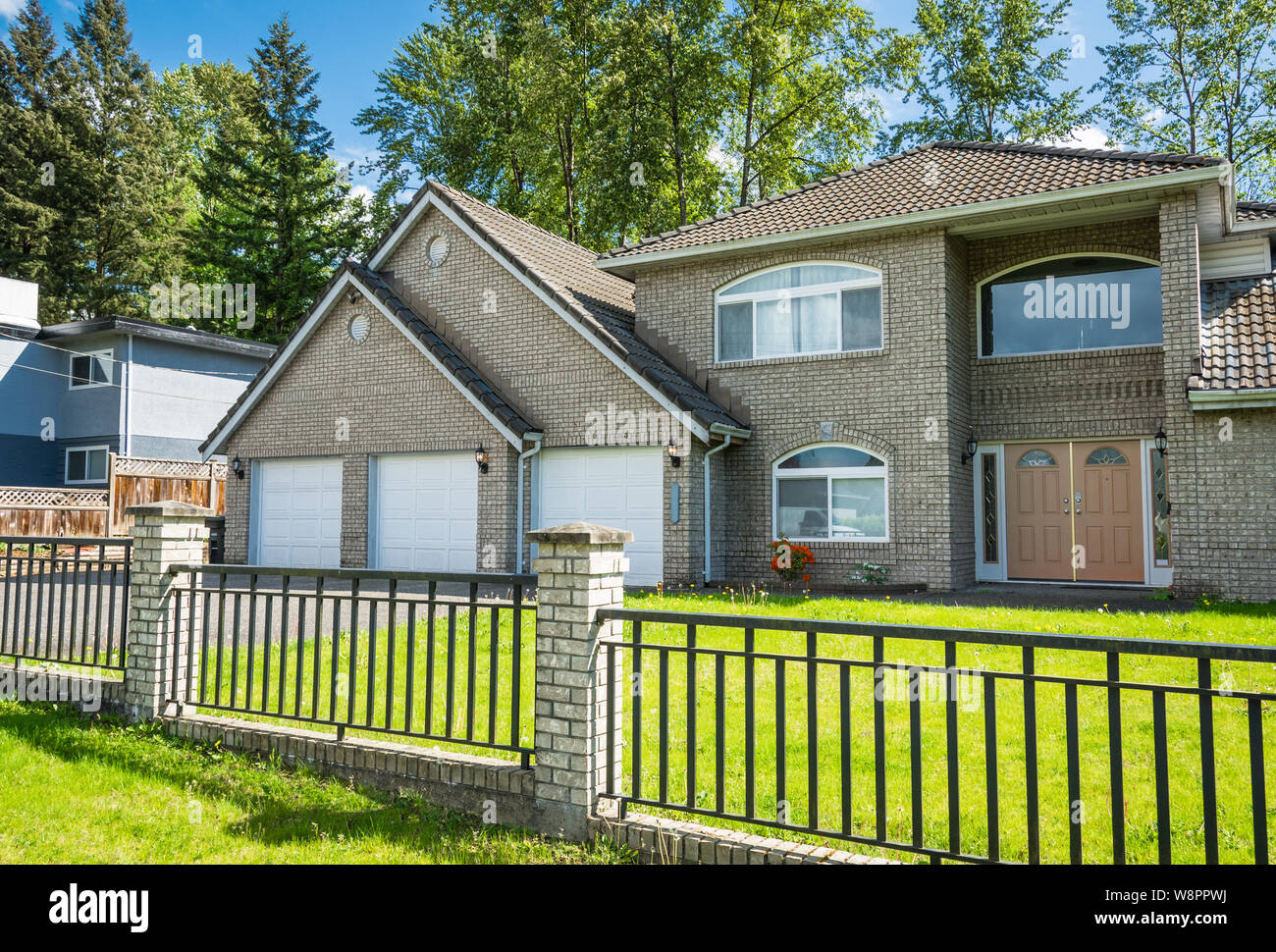 Big luxury residential house with gabble roof over three stall garage ...