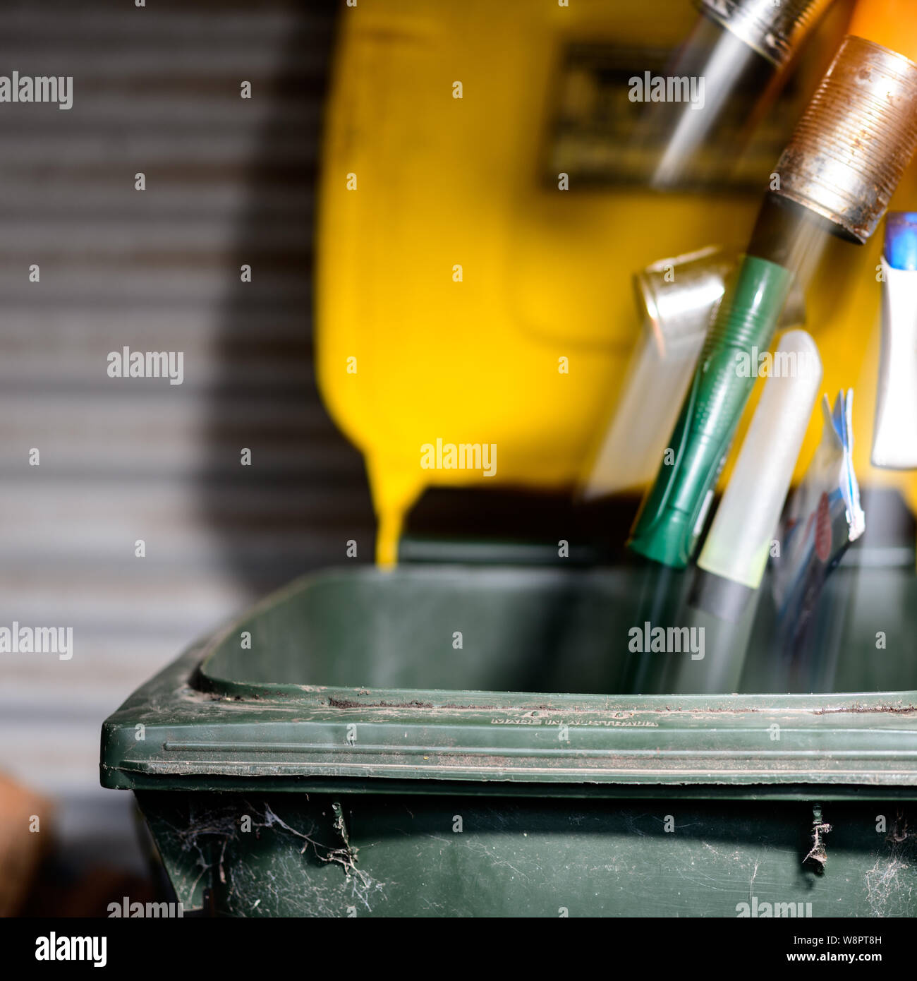 Filling the household Recycling Bin with plastic containers and empty ...