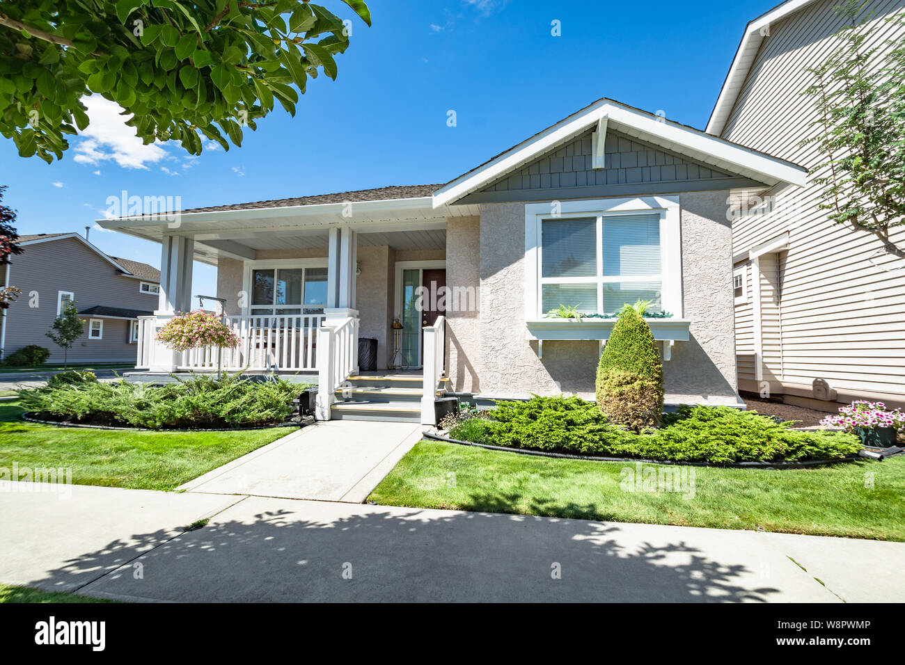 Entrance of residential house with concrete pathway in front of the ...