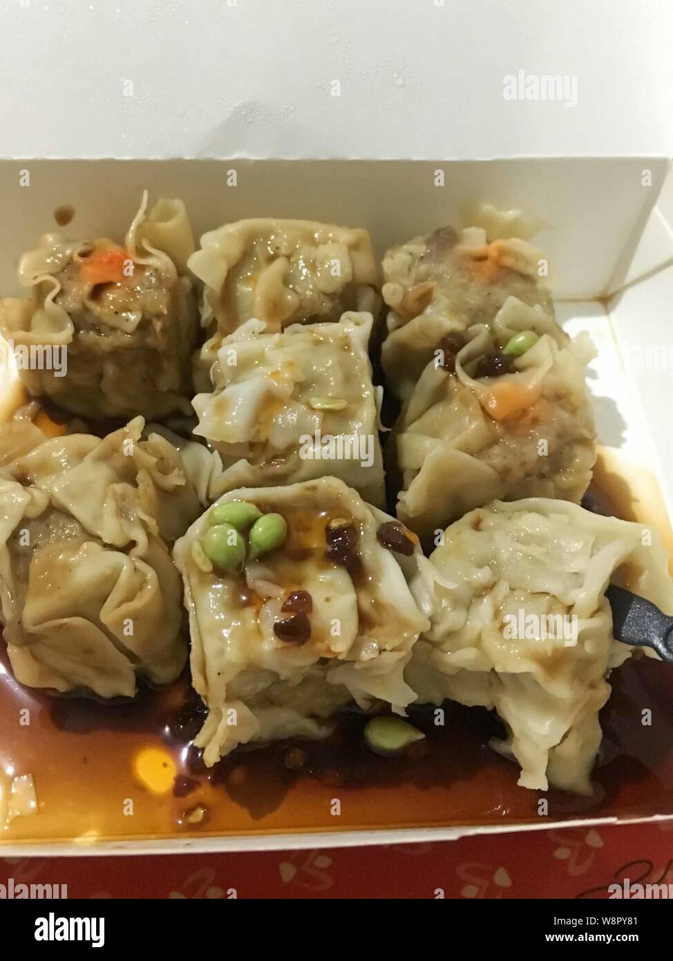 Steamed siomai or dimsum with chili and lemon on top Stock Photo - Alamy