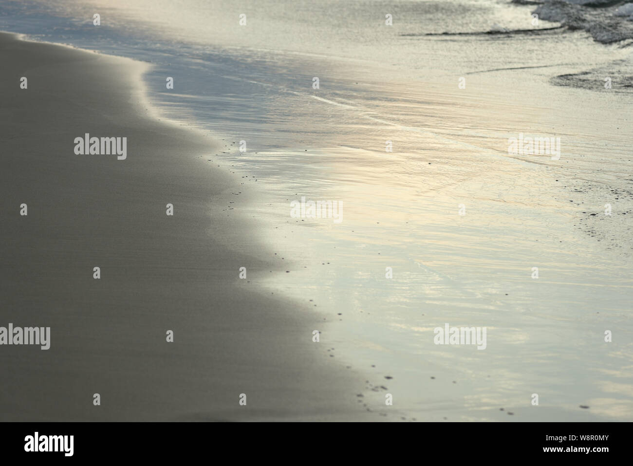 Evening sunlight on beach sand hi-res stock photography and images - Alamy