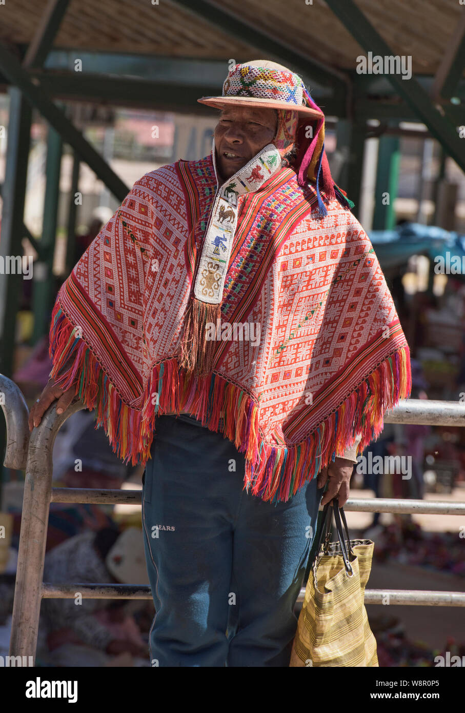 Traditional Andean highlander at the market in Urubamba, Sacred Valley ...