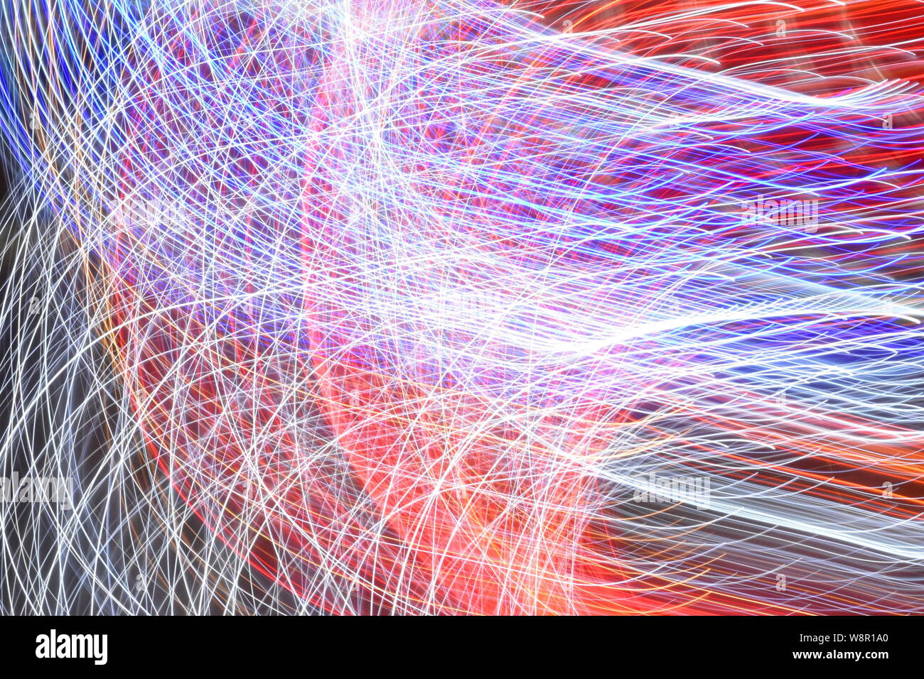 Abstract pattern of blue and red light curved lines forming a network ...