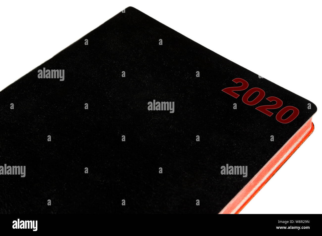 Notebook on the cover is written 2020. On a white background, isolate ...
