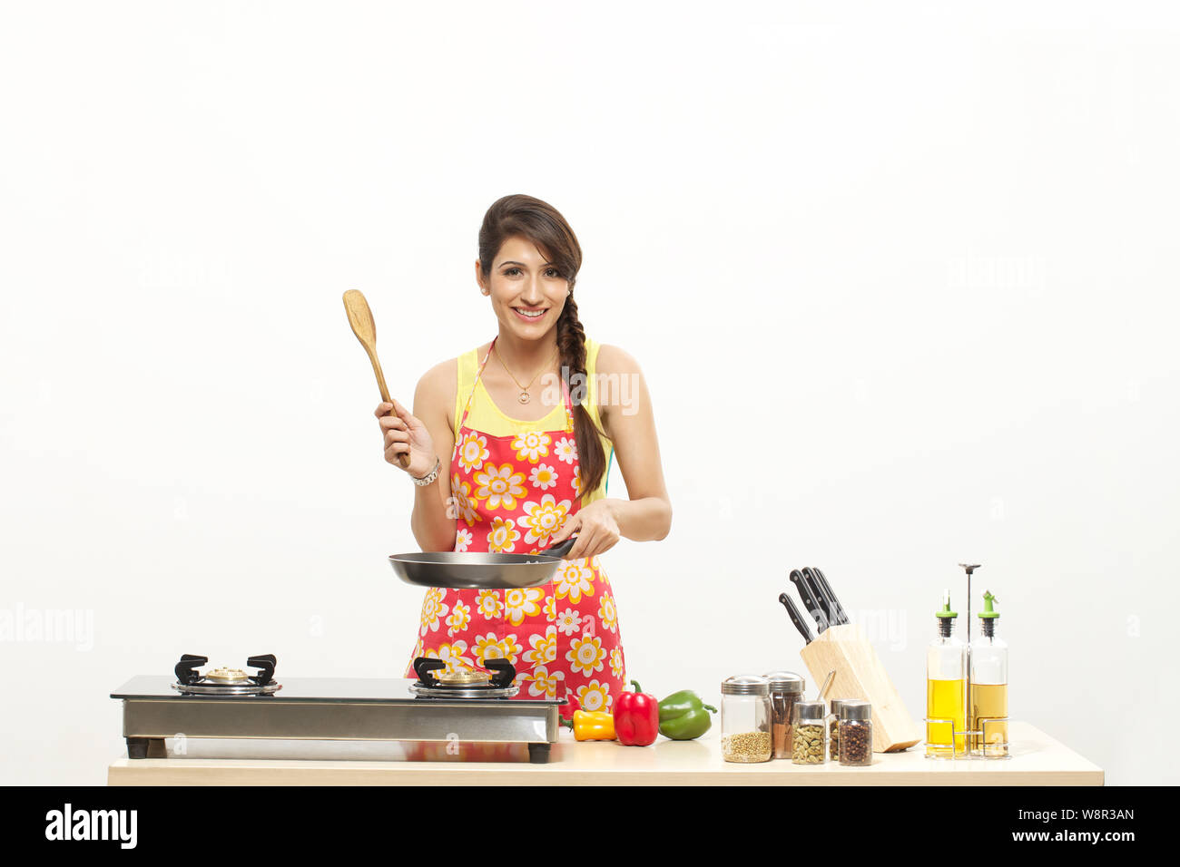 Indian woman cooking gas hi-res stock photography and images - Alamy