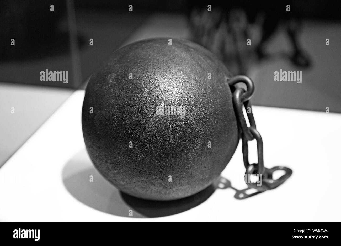 Foot with ball and chain Black and White Stock Photos & Images - Alamy