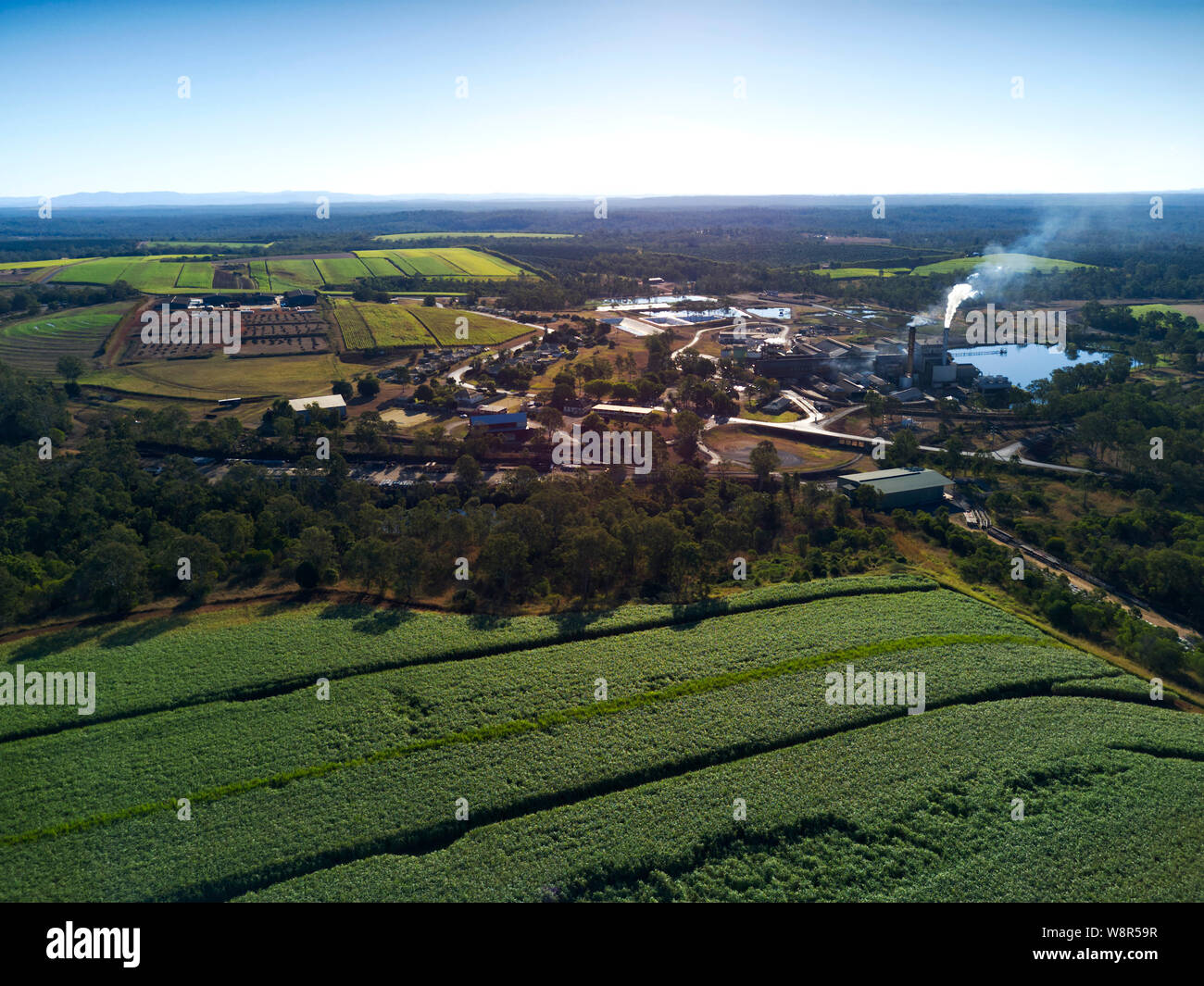 Aerial of the Isis Sugar Mill during the sugar cane crushing season ...