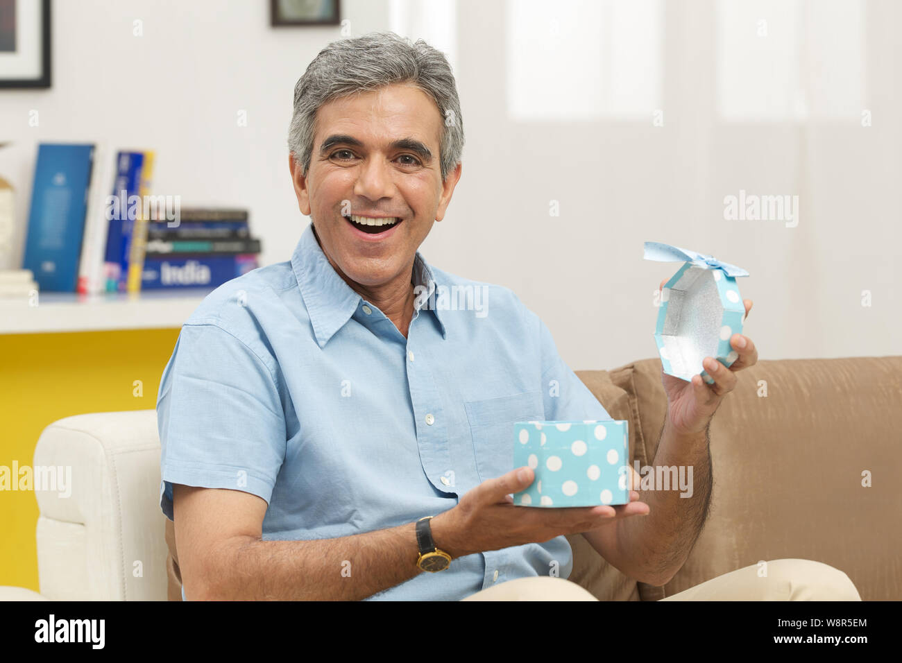 Old man surprise gift hi-res stock photography and images - Alamy