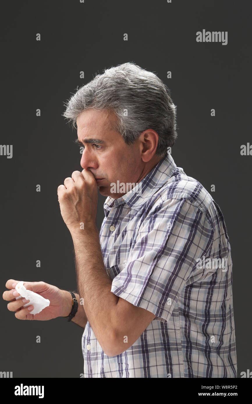 Senior man coughing Stock Photo - Alamy