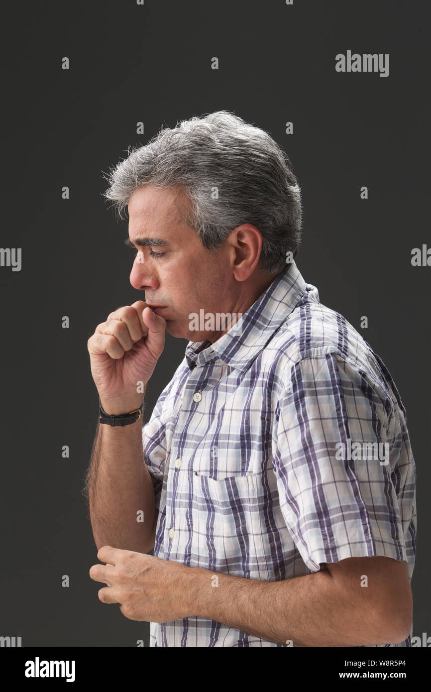 Senior man coughing Stock Photo - Alamy