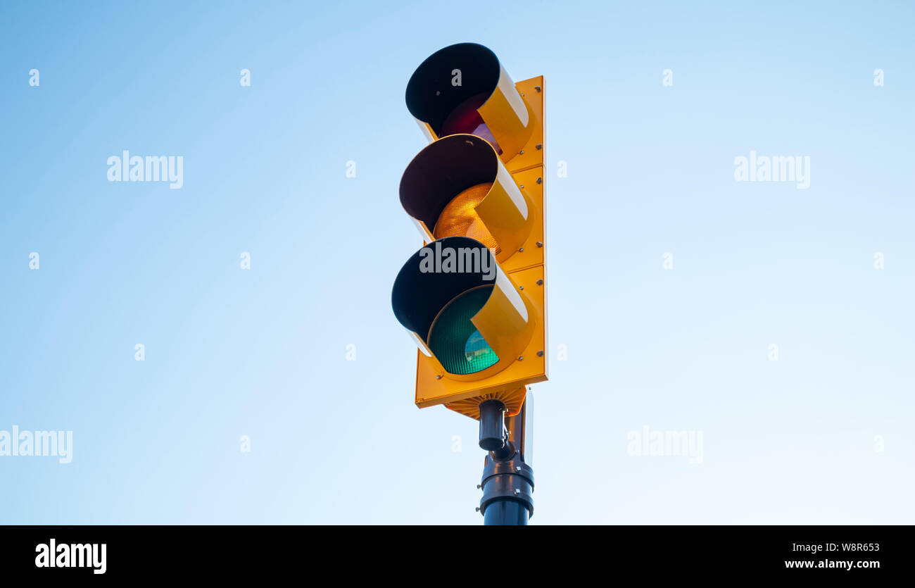 Go sign. Green traffic light for cars, blue sky background Stock Photo ...