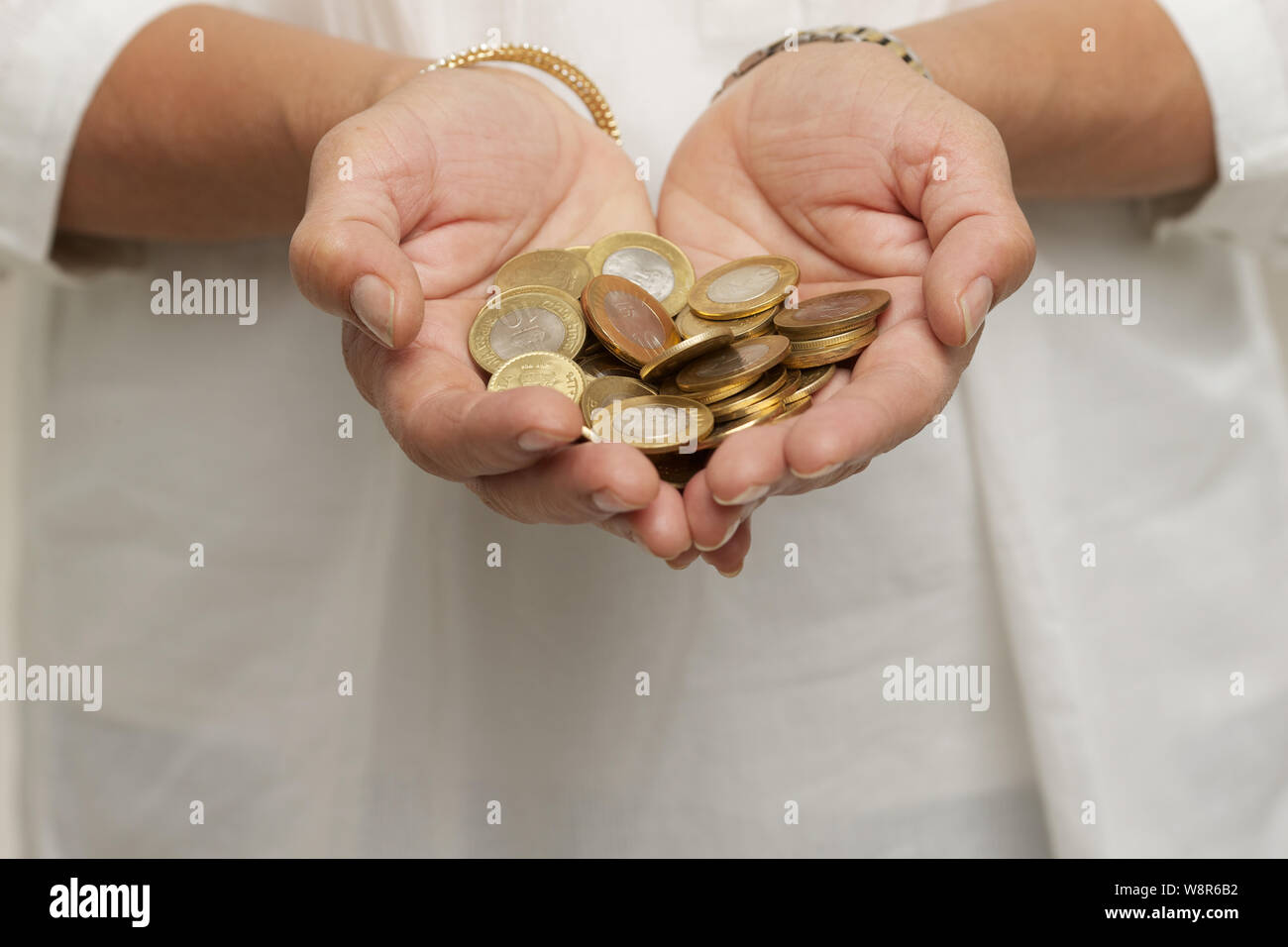 Woman cupping hands hi-res stock photography and images - Alamy