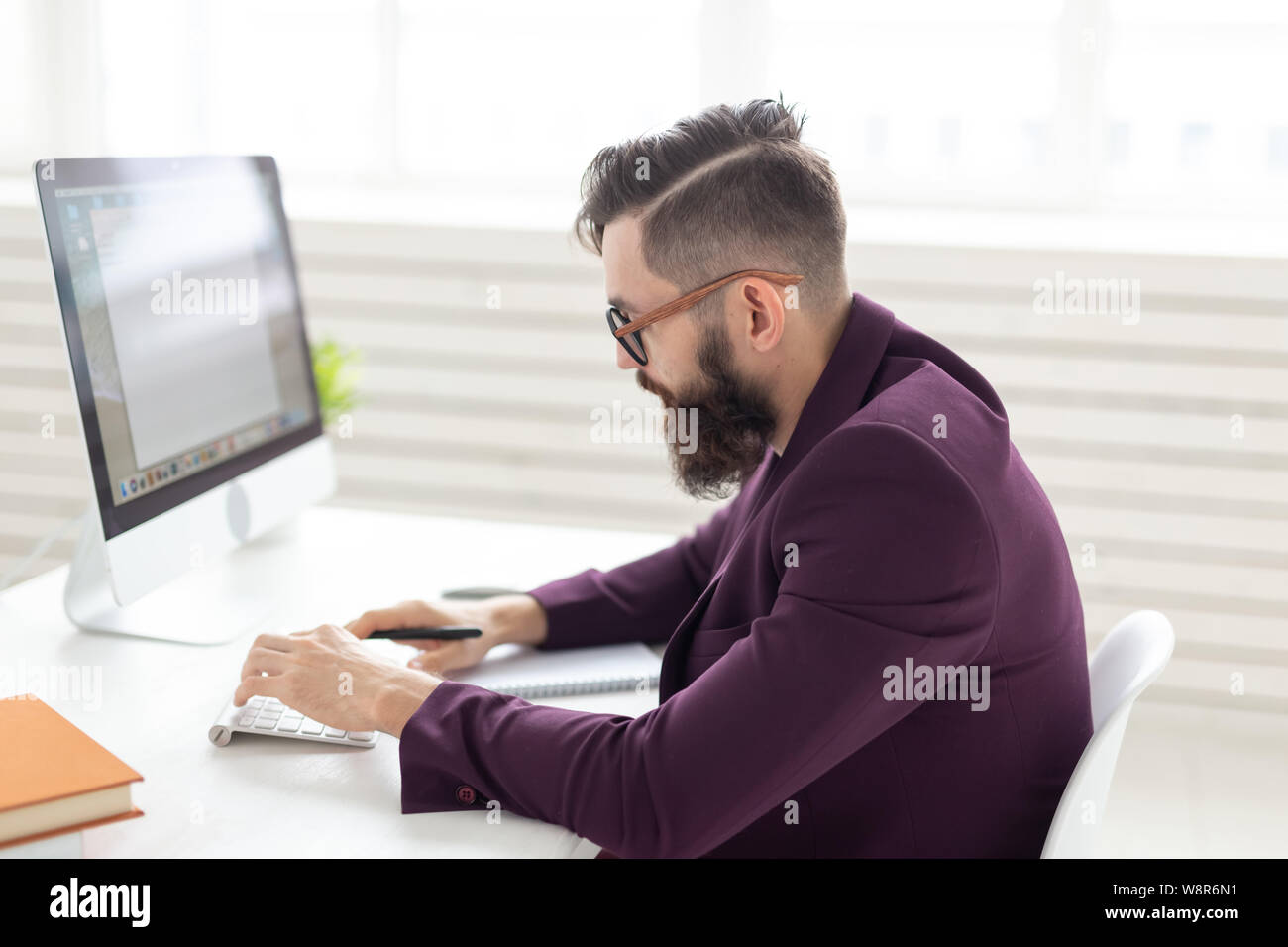 people, design and style concept - graphic designer sketching new ...