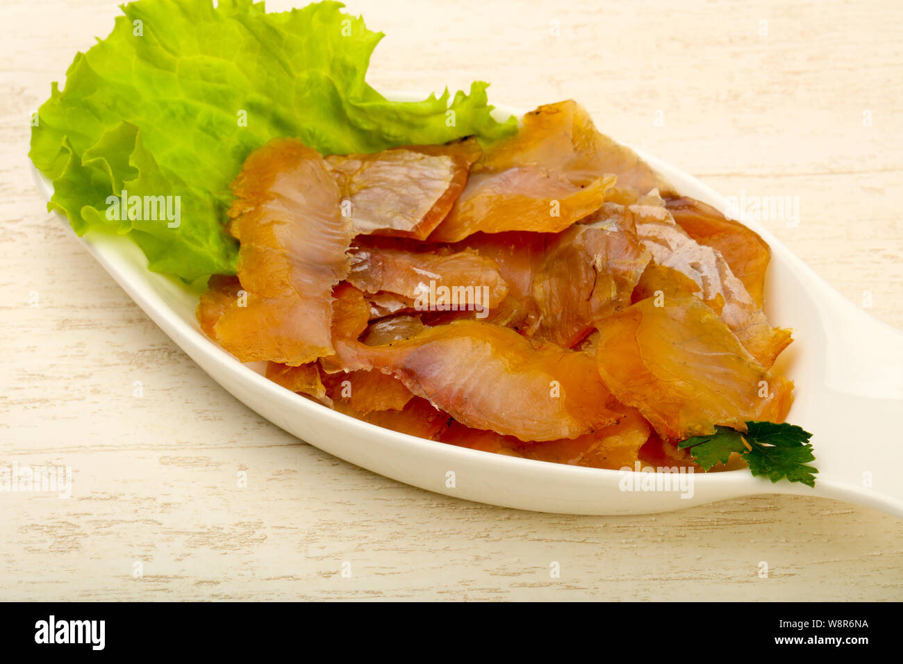 Smoked catfish fillet carpaccio Stock Photo - Alamy