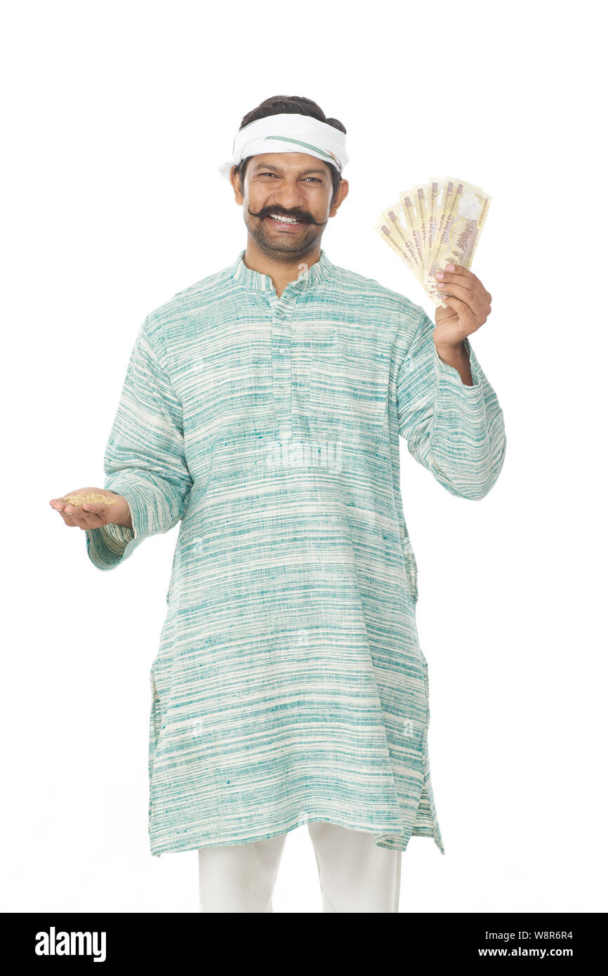 Indian rural man money showing hi-res stock photography and images - Alamy