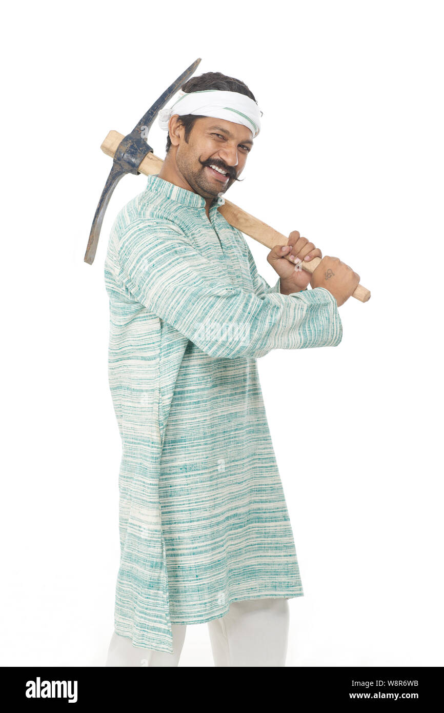 Farmer standing with a pick axe isolated on white background Stock ...