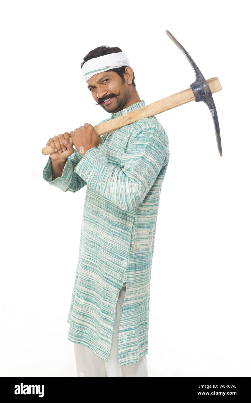 Farmer standing with a pick axe isolated on white background Stock ...