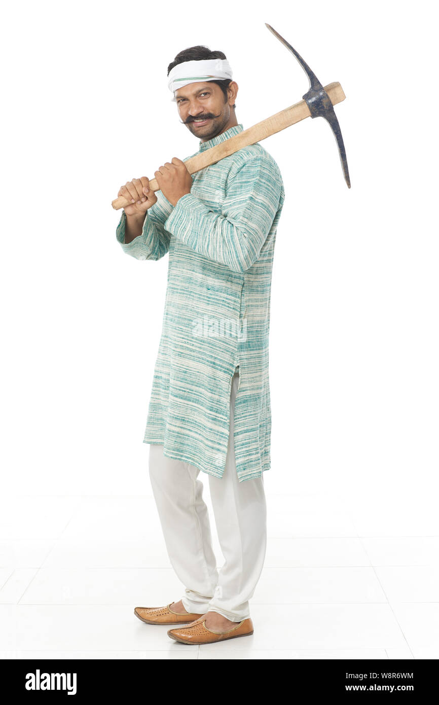 Farmer standing with a pick axe isolated on white background Stock ...