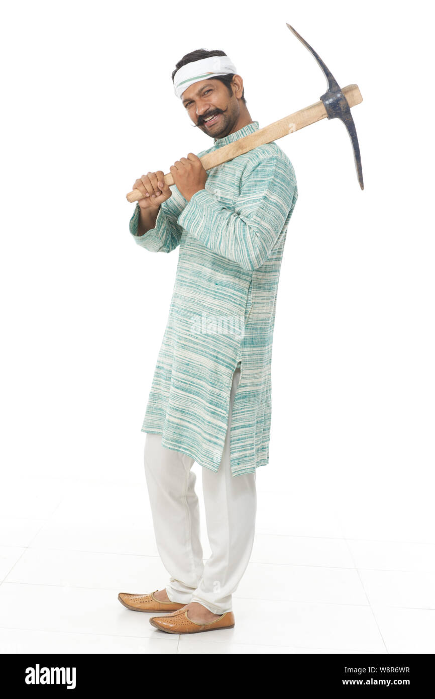 Farmer standing with a pick axe isolated on white background Stock ...