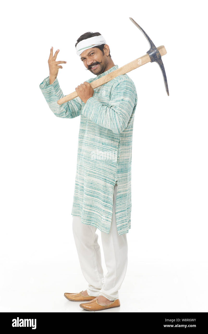 Farmer standing with a pick axe isolated on white background Stock ...