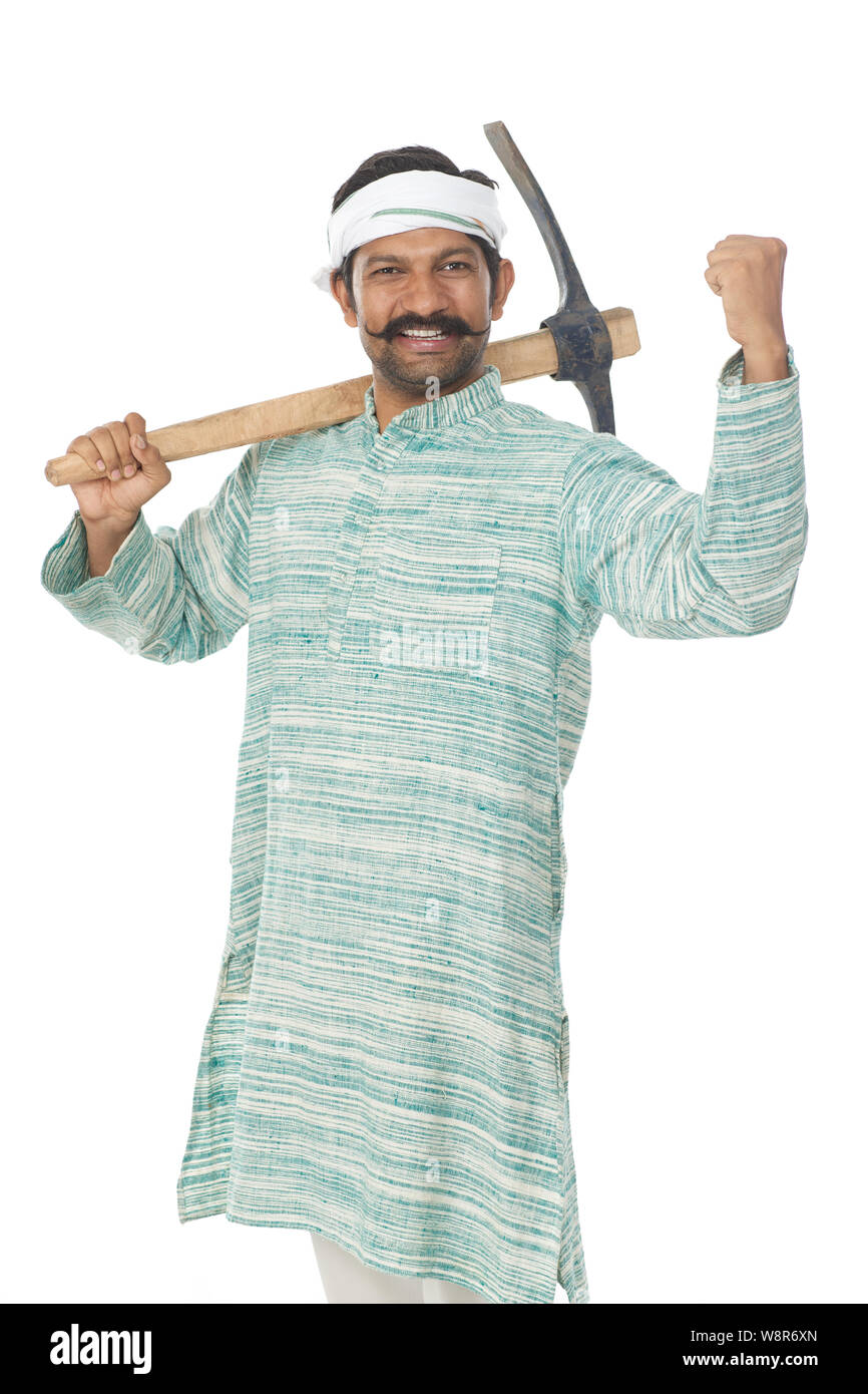 Farmer standing with a pick axe isolated on white background Stock ...